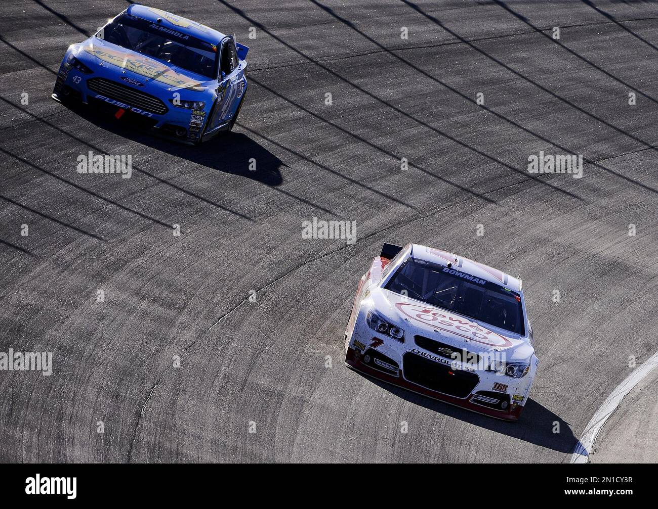 Alex Bowman (7) and Aric Almirola (43) drive their cars during the ...
