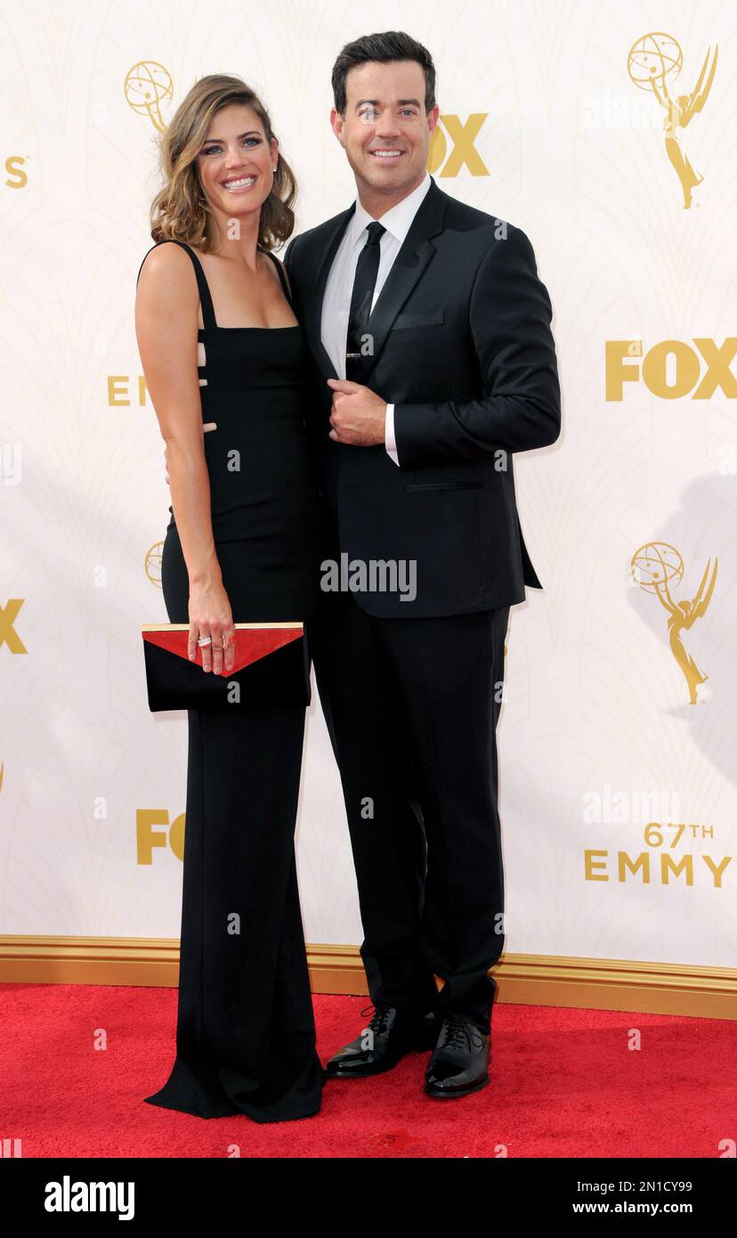 Siri Pinter, left, and Carson Daly arrive at the 67th Primetime Emmy ...