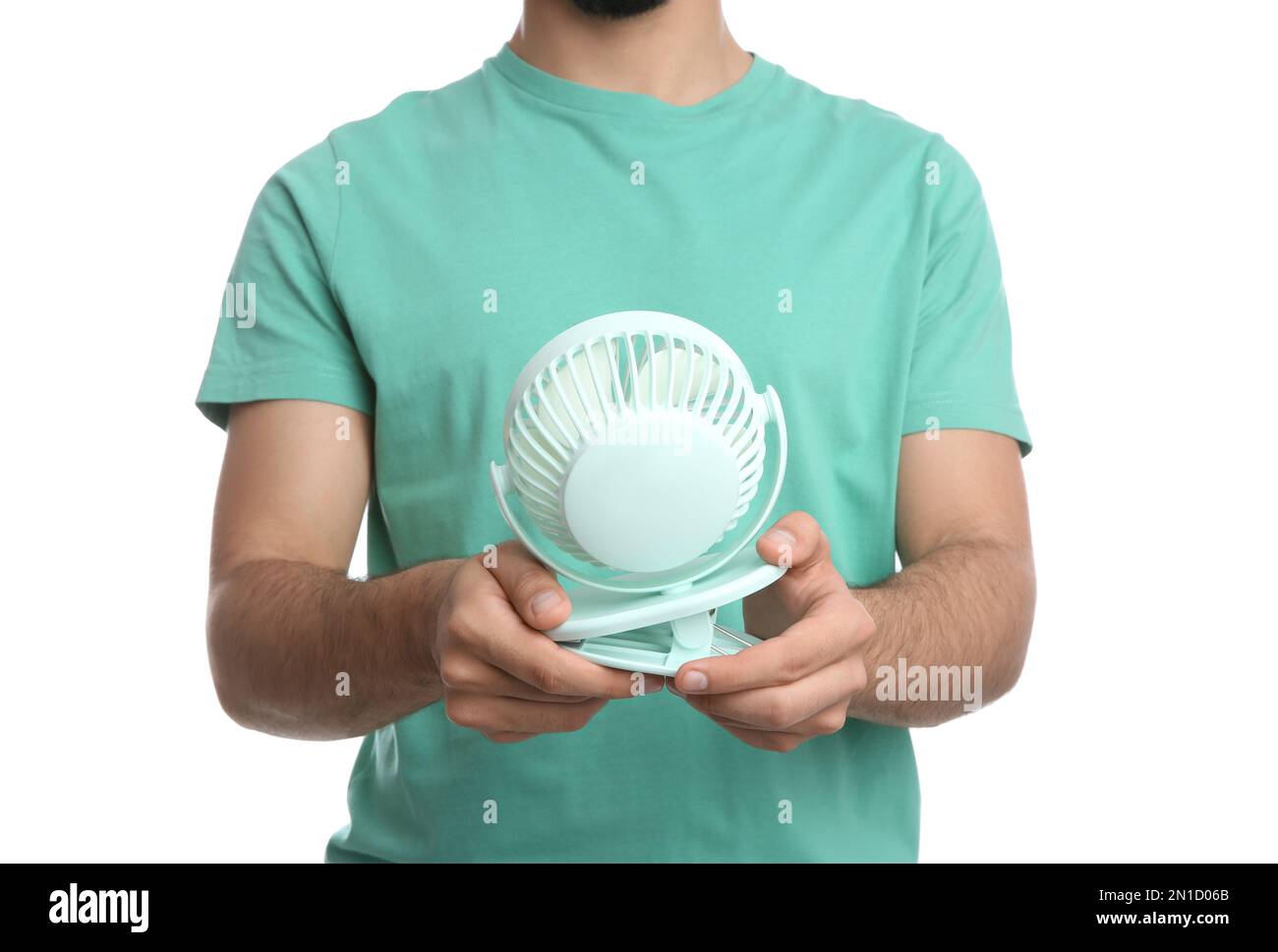 Man with portable fan on white background, closeup. Summer heat Stock ...