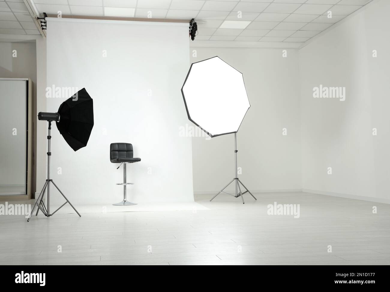 Photo studio interior with set of professional equipment Stock Photo ...