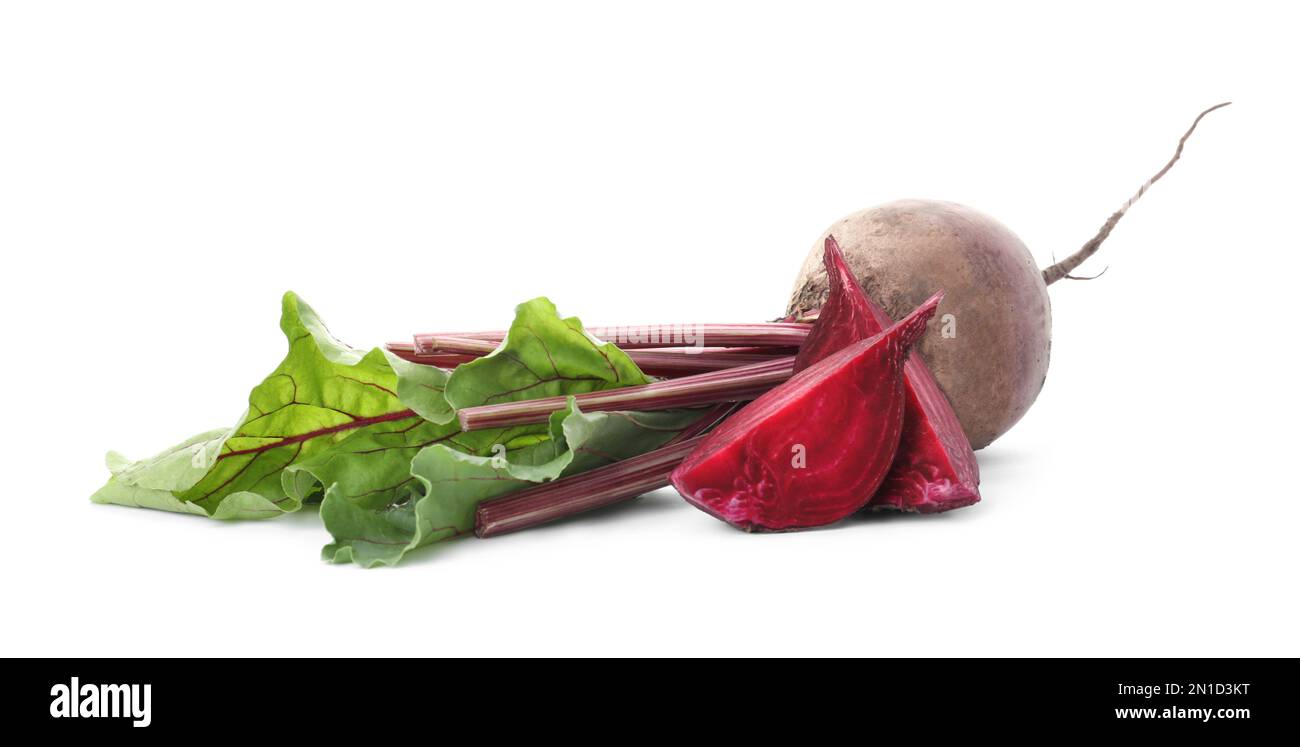 Whole and cut red beets on white background Stock Photo - Alamy