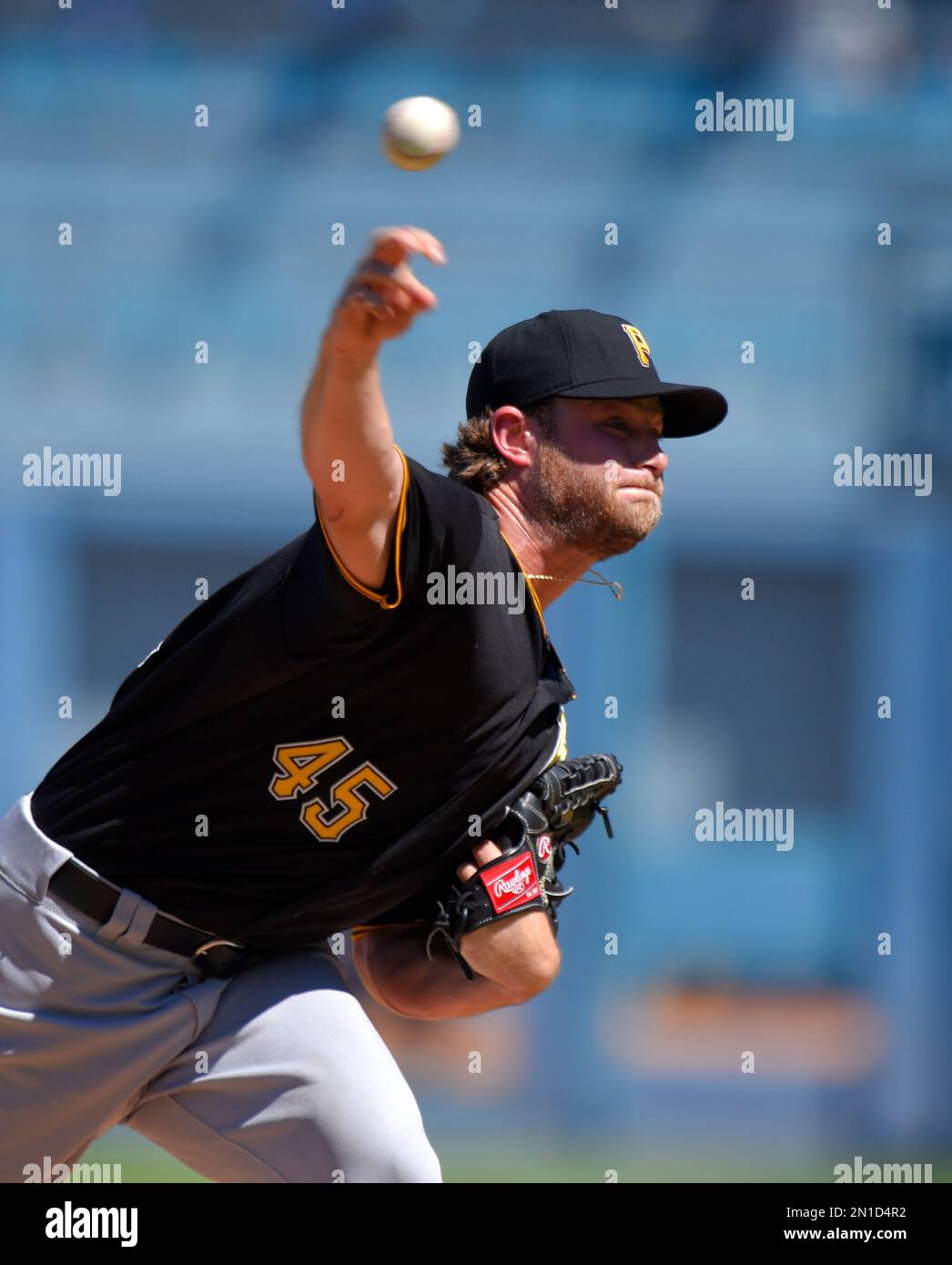Pittsburgh Pirates starting pitcher Gerrit Cole throws to the plate ...