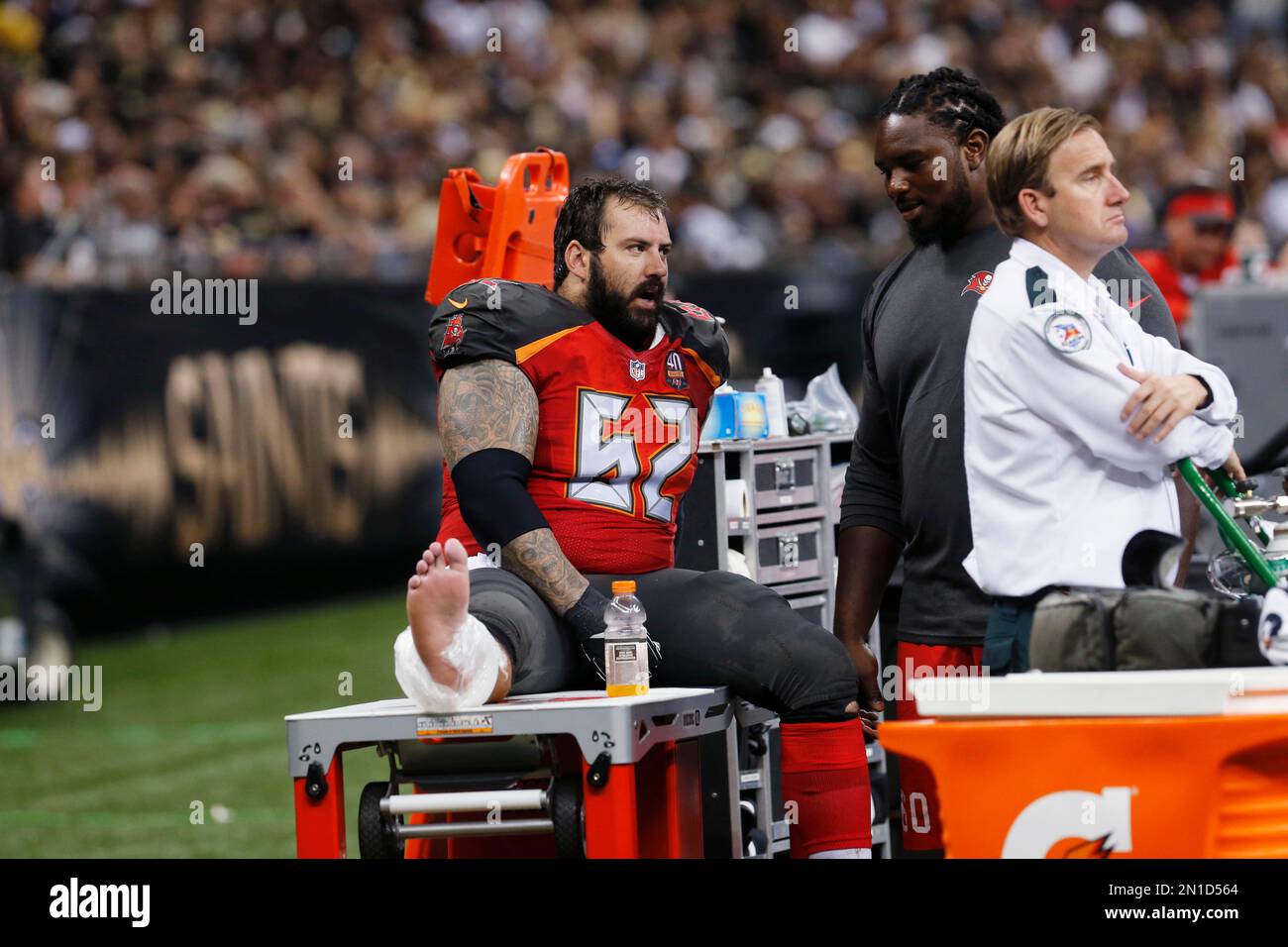 Tampa Bay Buccaneers linebacker Jeremiah George (52) is carted off the ...