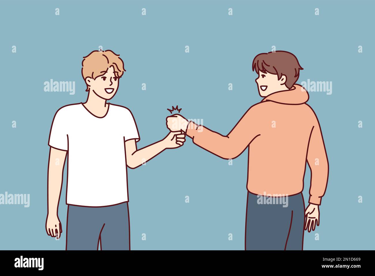 Two young guys bump their fists when they meet, making greeting to ...