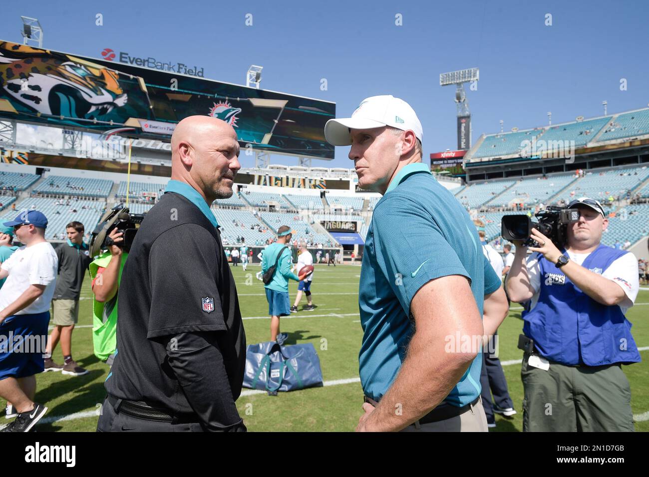 Miami Dolphins head coach Joe Philbin, right, greets Jacksonville ...