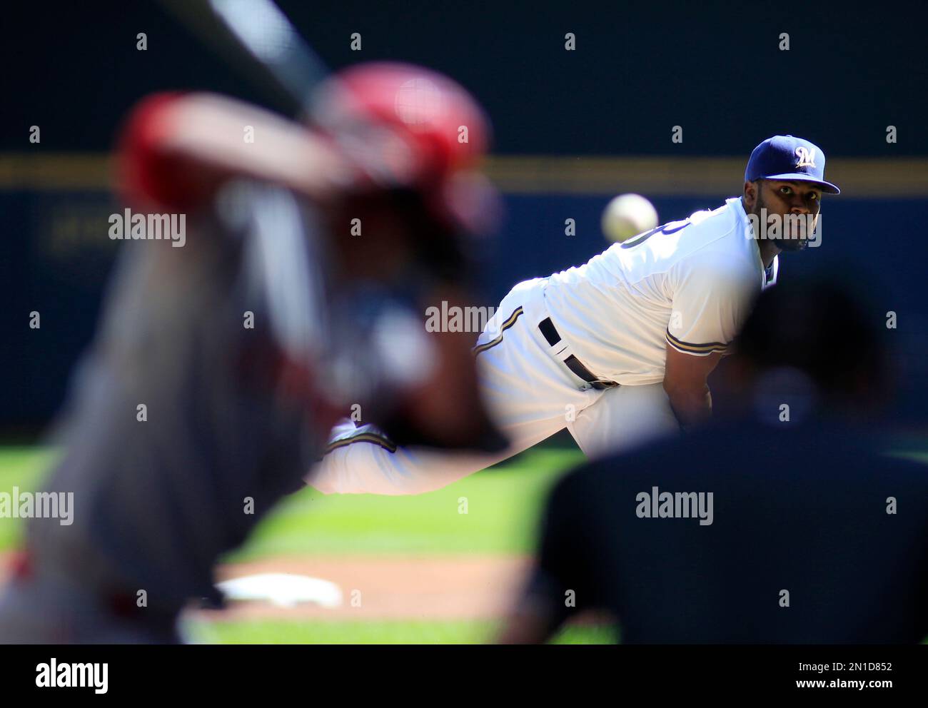 Milwaukee Brewers pitcher Ariel Pena throws to the Cincinnati Reds ...