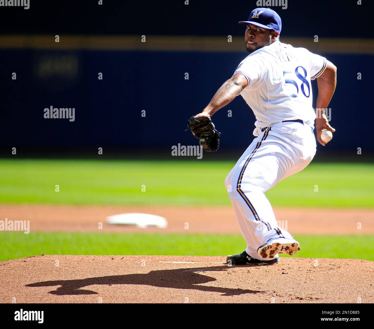 Milwaukee Brewers pitcher Ariel Pena pitches to the Cincinnati Reds ...