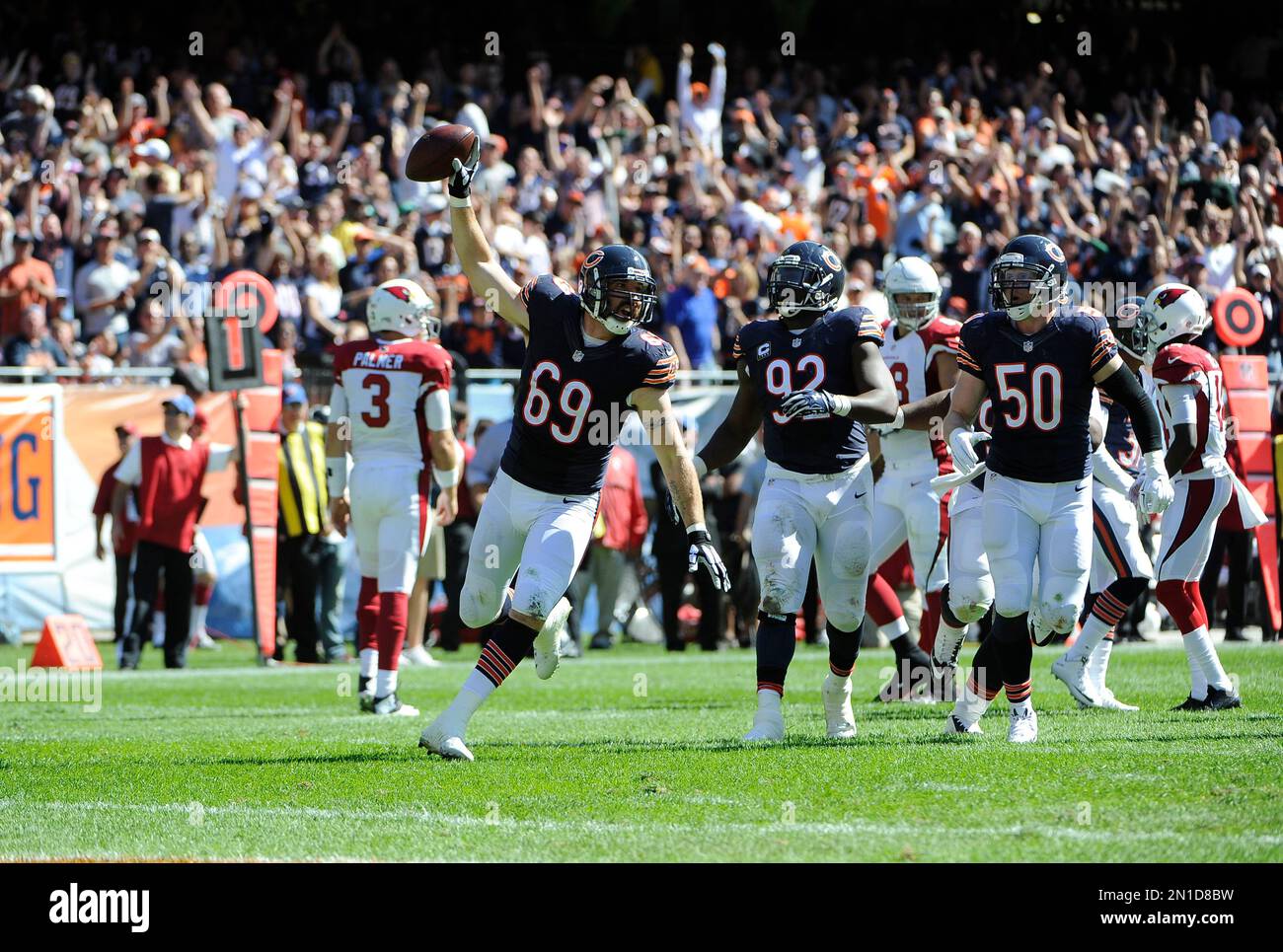 Chicago Bears linebacker Jared Allen (69) celebrates after intercepting ...