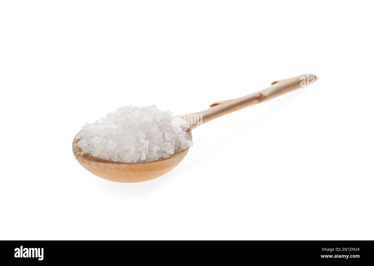 Wooden spoon with salt isolated on white Stock Photo - Alamy