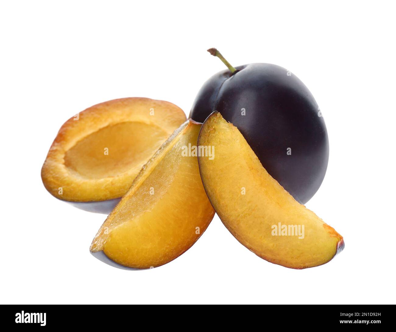 Whole and cut ripe plums isolated on white Stock Photo - Alamy