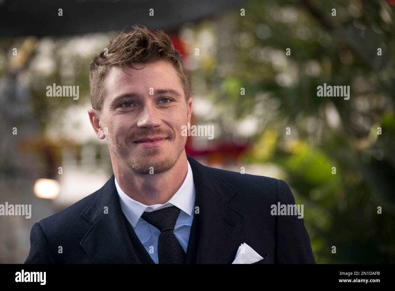 Actor Garrett Hedlund poses for photographs as he arrives for the World ...