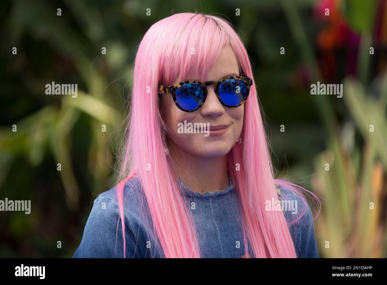 British singer Lily Allen poses for photographs as she arrives for the ...