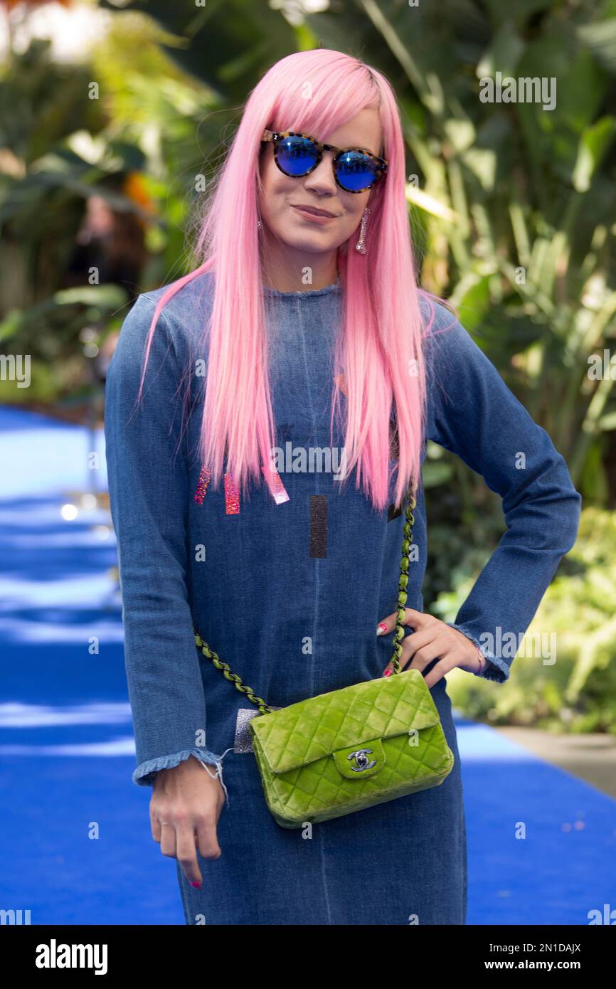 British singer Lily Allen poses for photographs as she arrives for the ...