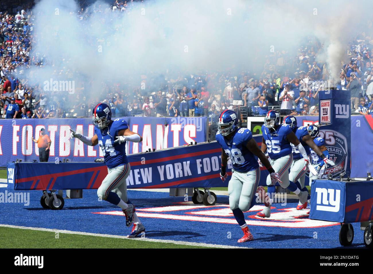 New York Giants players take the field prior to an NFL football game ...