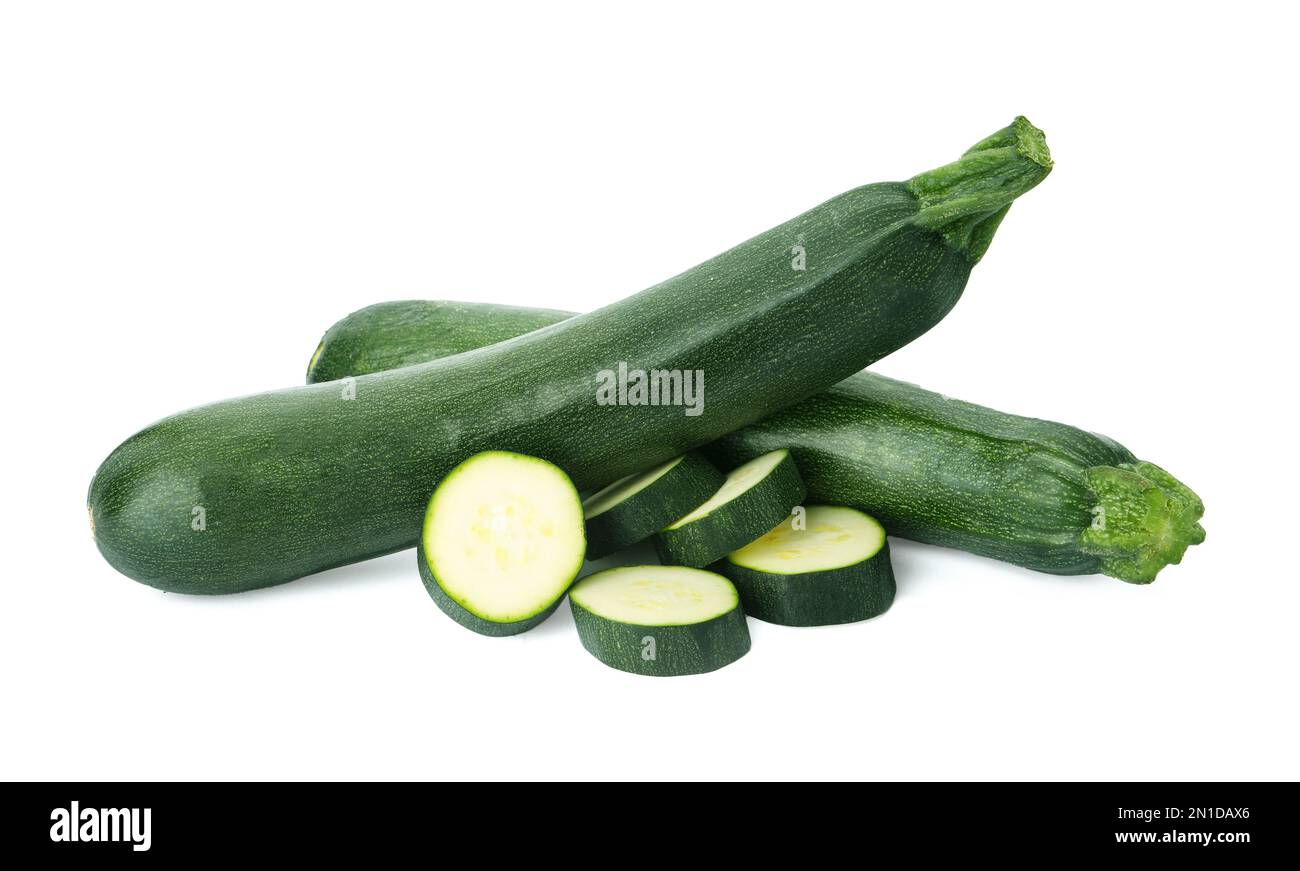 Cut and whole green ripe zucchini isolated on white Stock Photo - Alamy