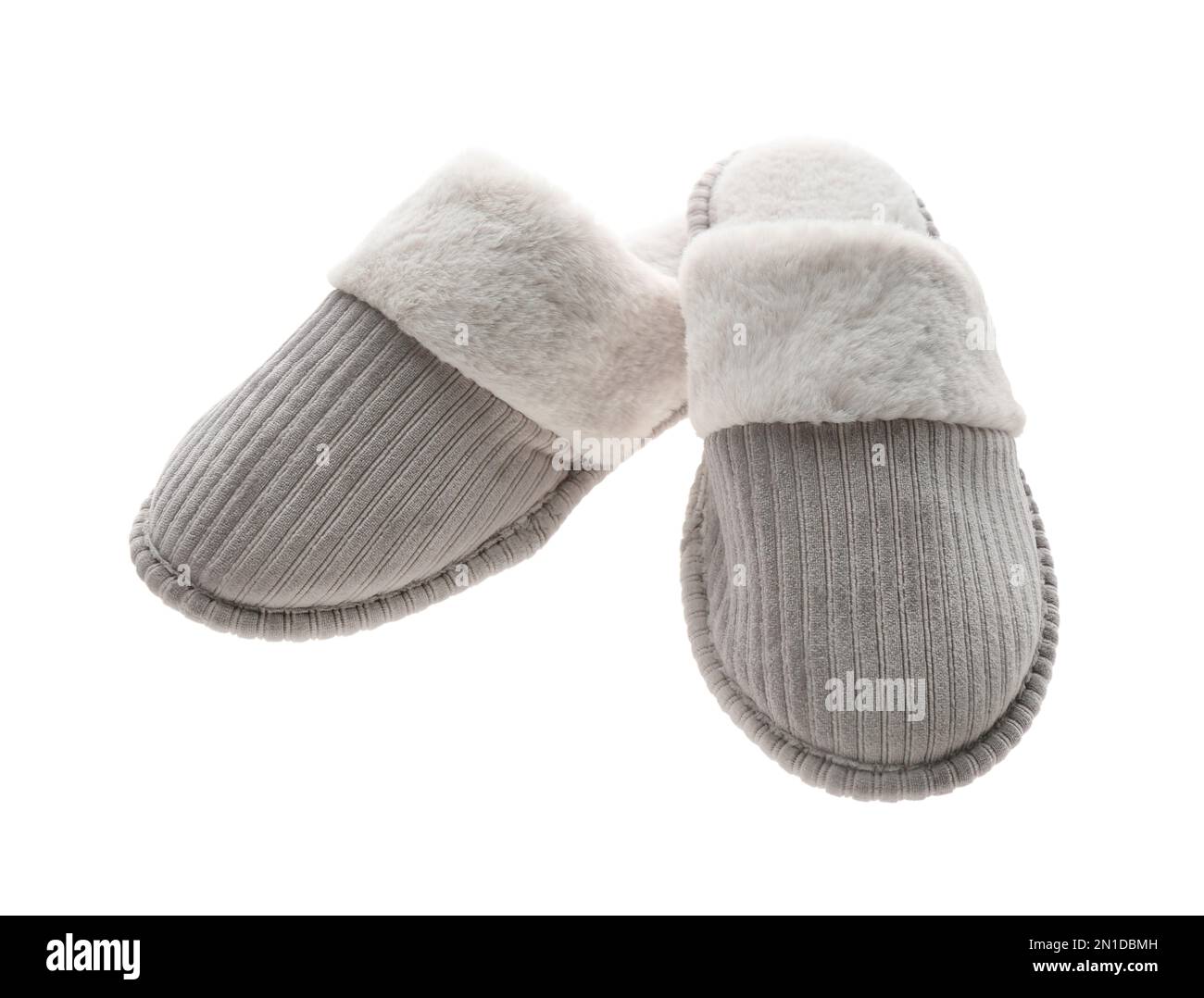 Pair of soft closed toe slippers on white background Stock Photo - Alamy