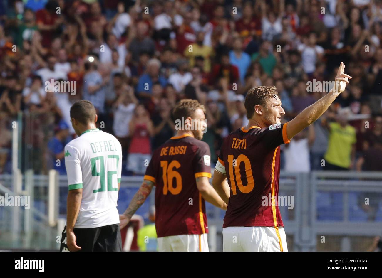 Roma’s Francesco Totti, right, celebrates after scoring during a Serie ...
