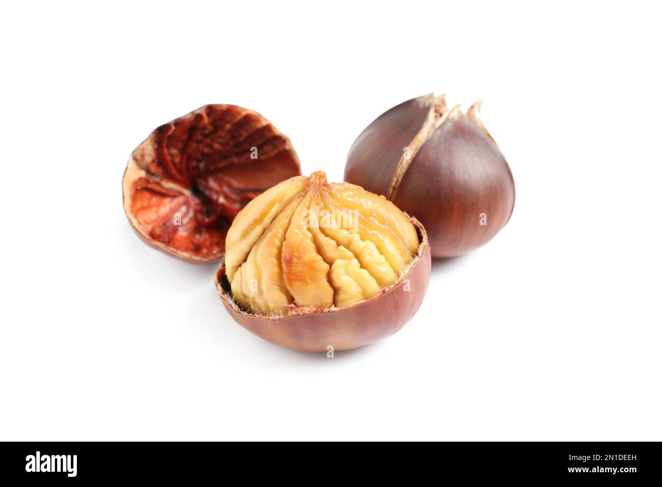 Delicious sweet roasted edible chestnuts isolated on white Stock Photo ...