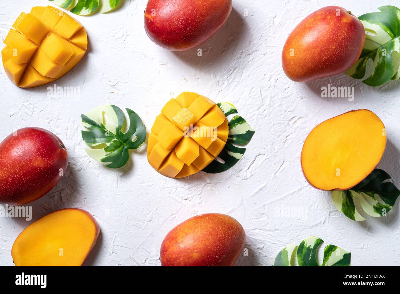 Mango background design concept. Top view of diced fresh mango fruit ...