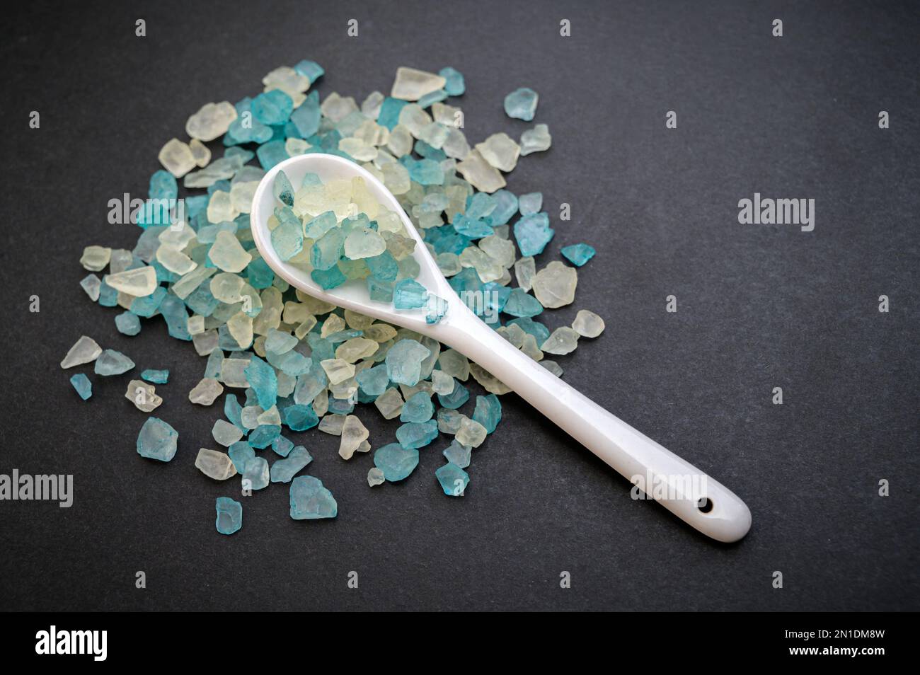 Top view of natural sea salt on dark background Stock Photo - Alamy