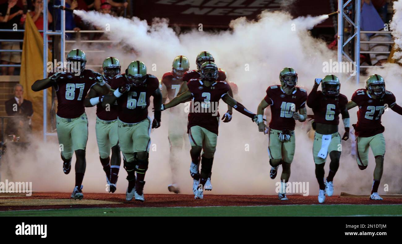 Boston College players take the field during the first half of an NCAA ...