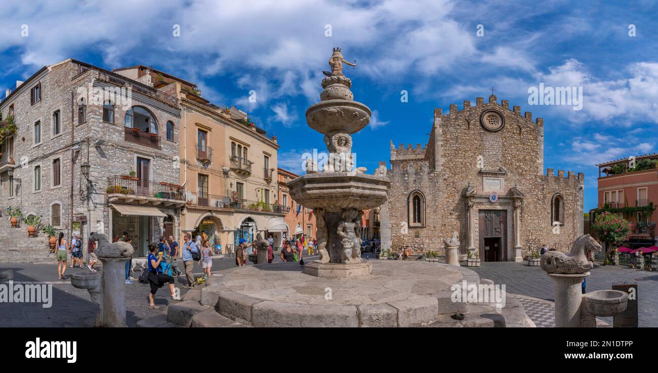 View of Duomo di Taormina and fountain in Piazza del Duomo in Taormina ...