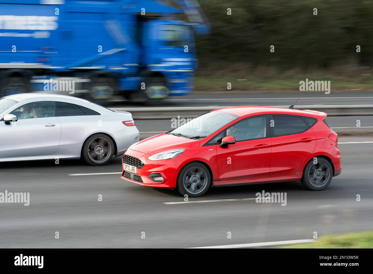 Vehicles at speed on the M40 motorway, Warwickshire, UK Stock Photo - Alamy