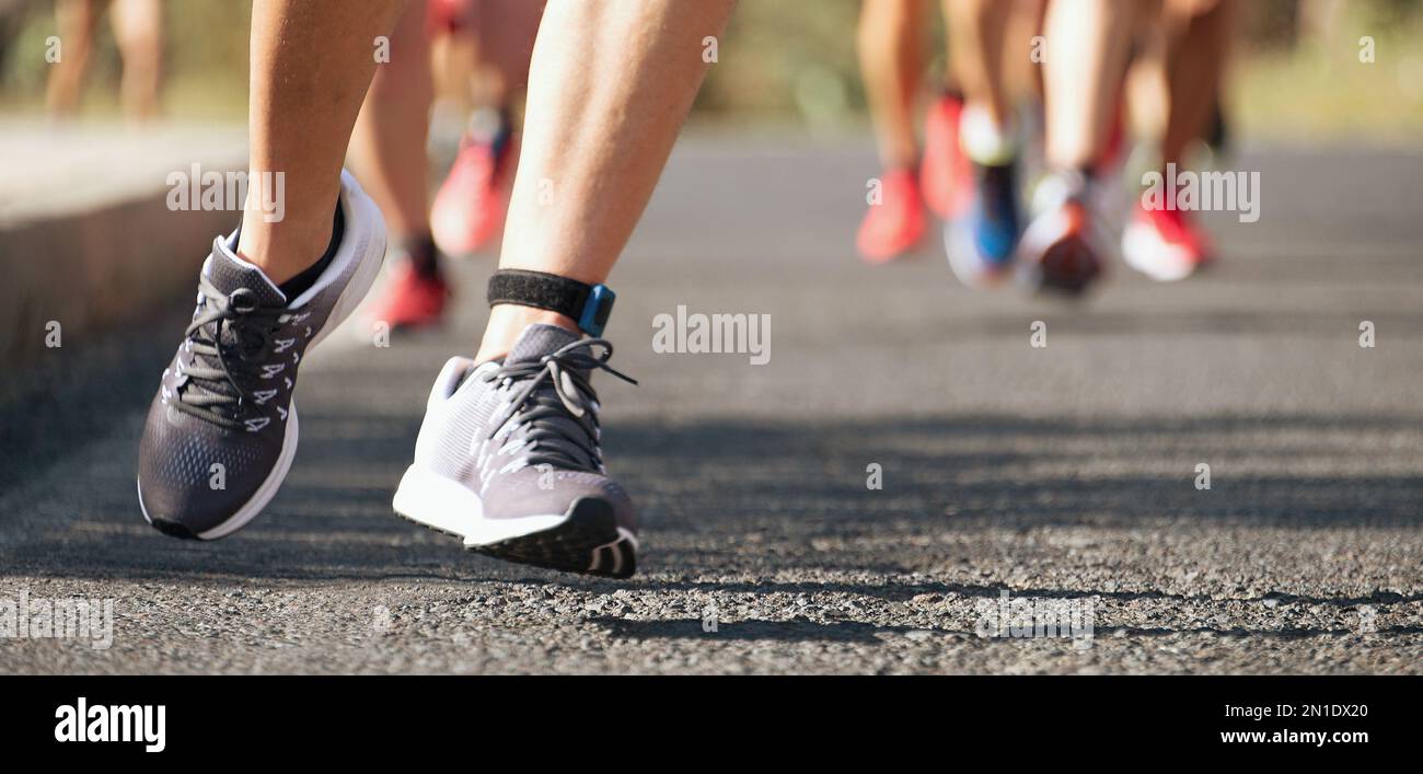 Marathon running race, runners feet on road, sport, fitness and healthy ...