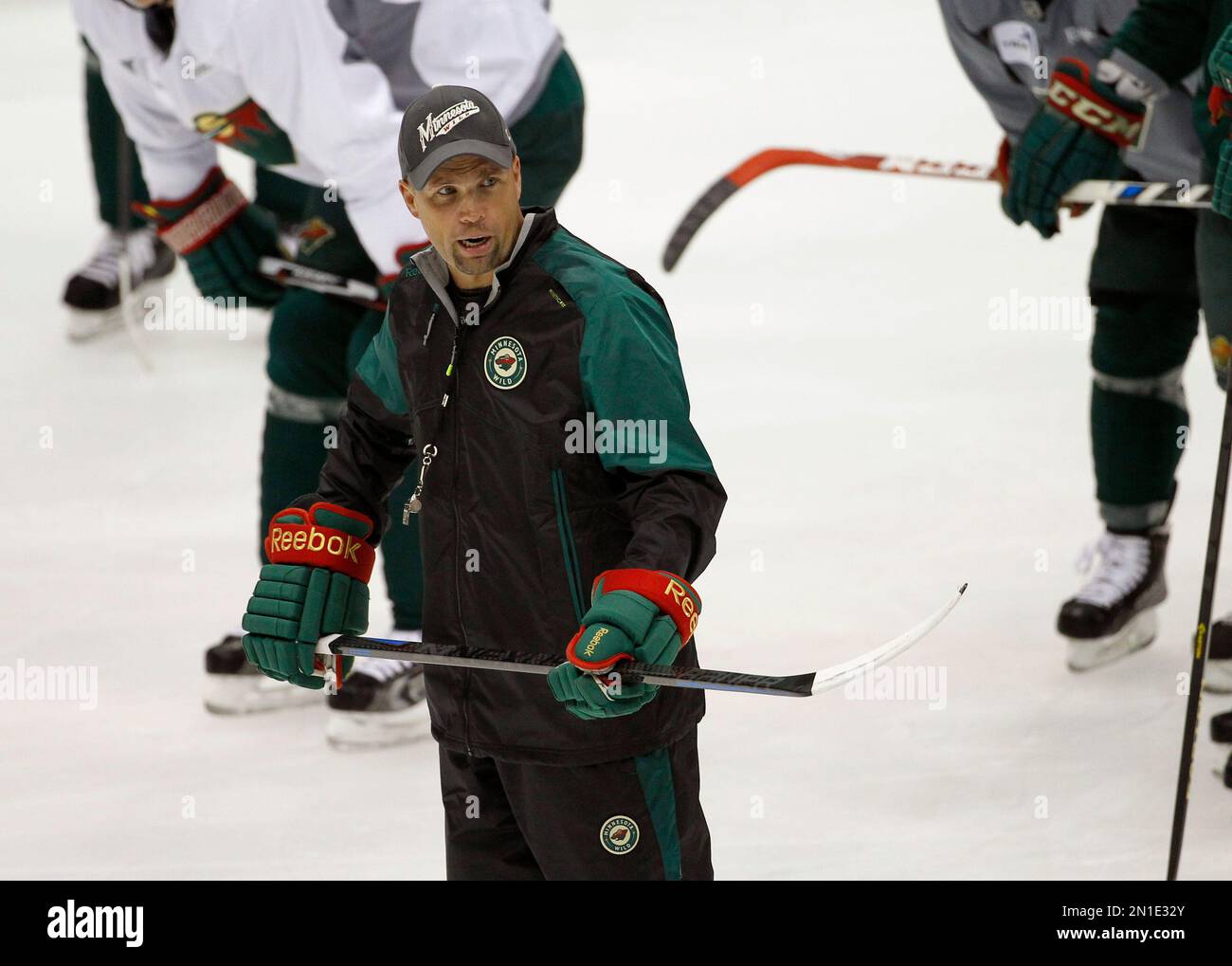 Minnesota Wild head coach Mike Yeo talks to his players during NHL ...