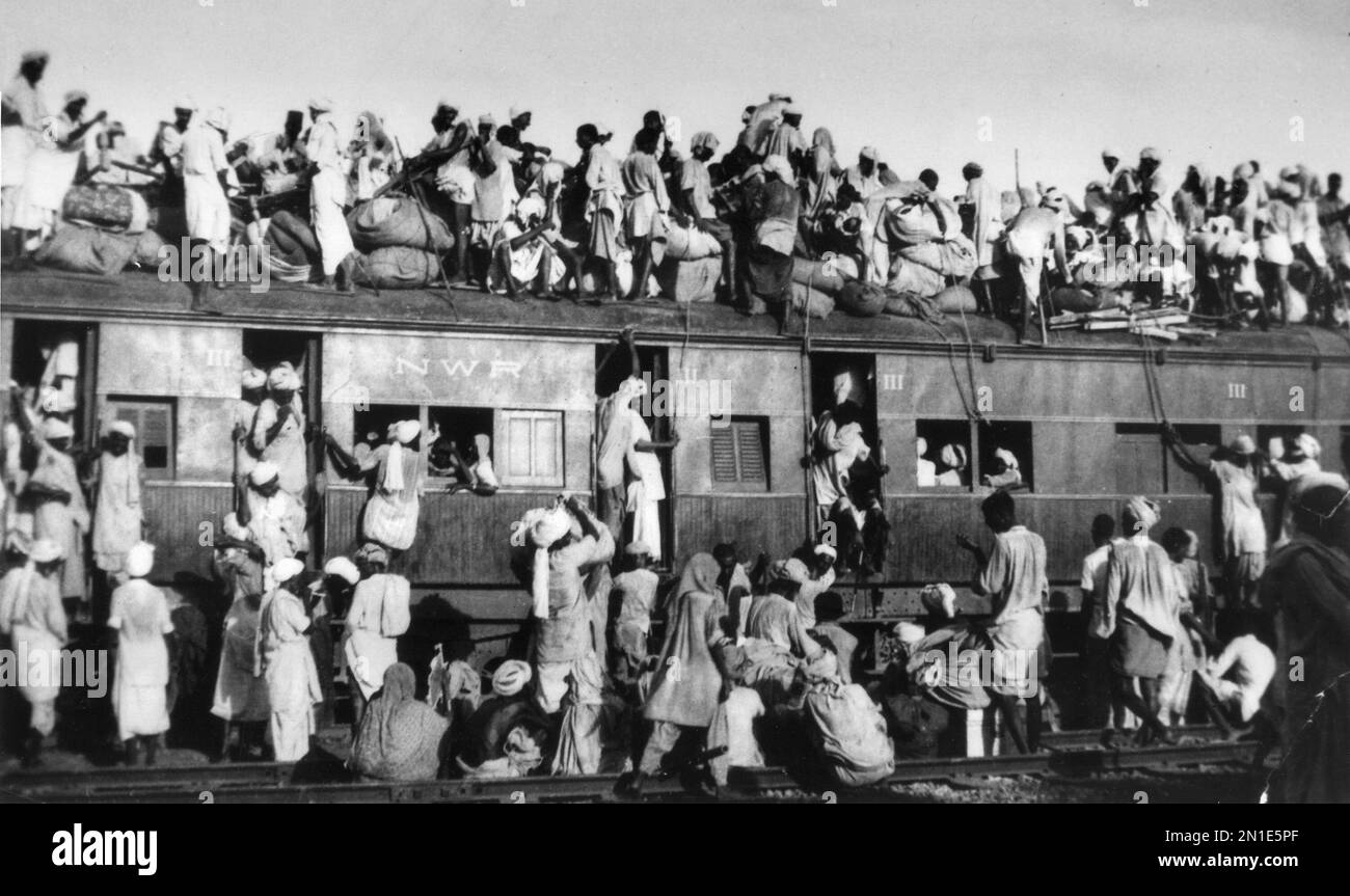 FILE - In this Sept. 19, 1947 file photo, Muslim refugees sit on the ...