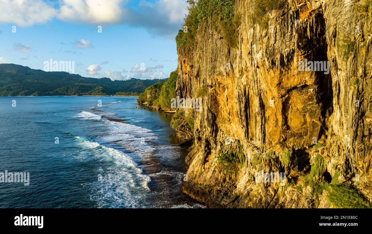 Limestone cliffs at sunset, Rurutu, Austral islands, French Polynesia ...