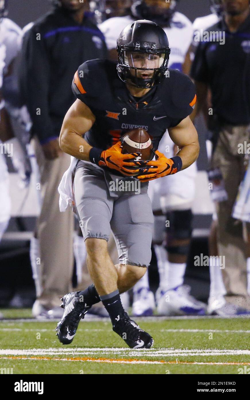 Oklahoma State wide receiver David Glidden (13) carries during an NCAA college football game ...