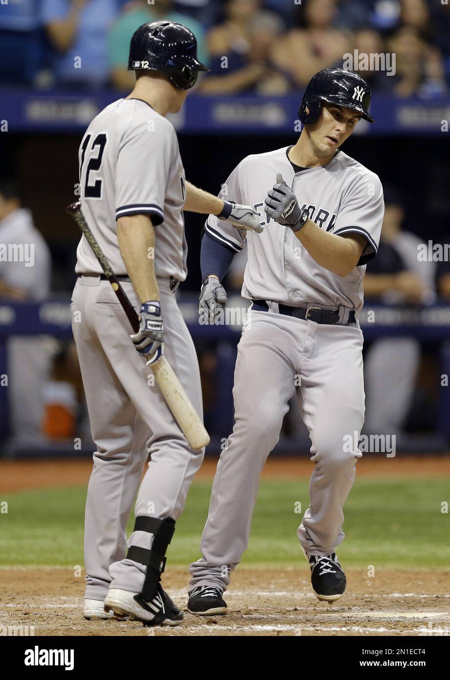 New York Yankees' Greg Bird, right, celebrates with on-deck batter ...