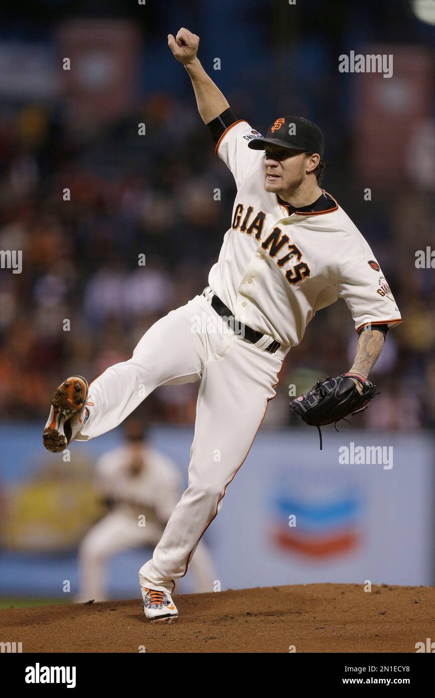 San Francisco Giants pitcher Jake Peavy watches a delivery to the ...