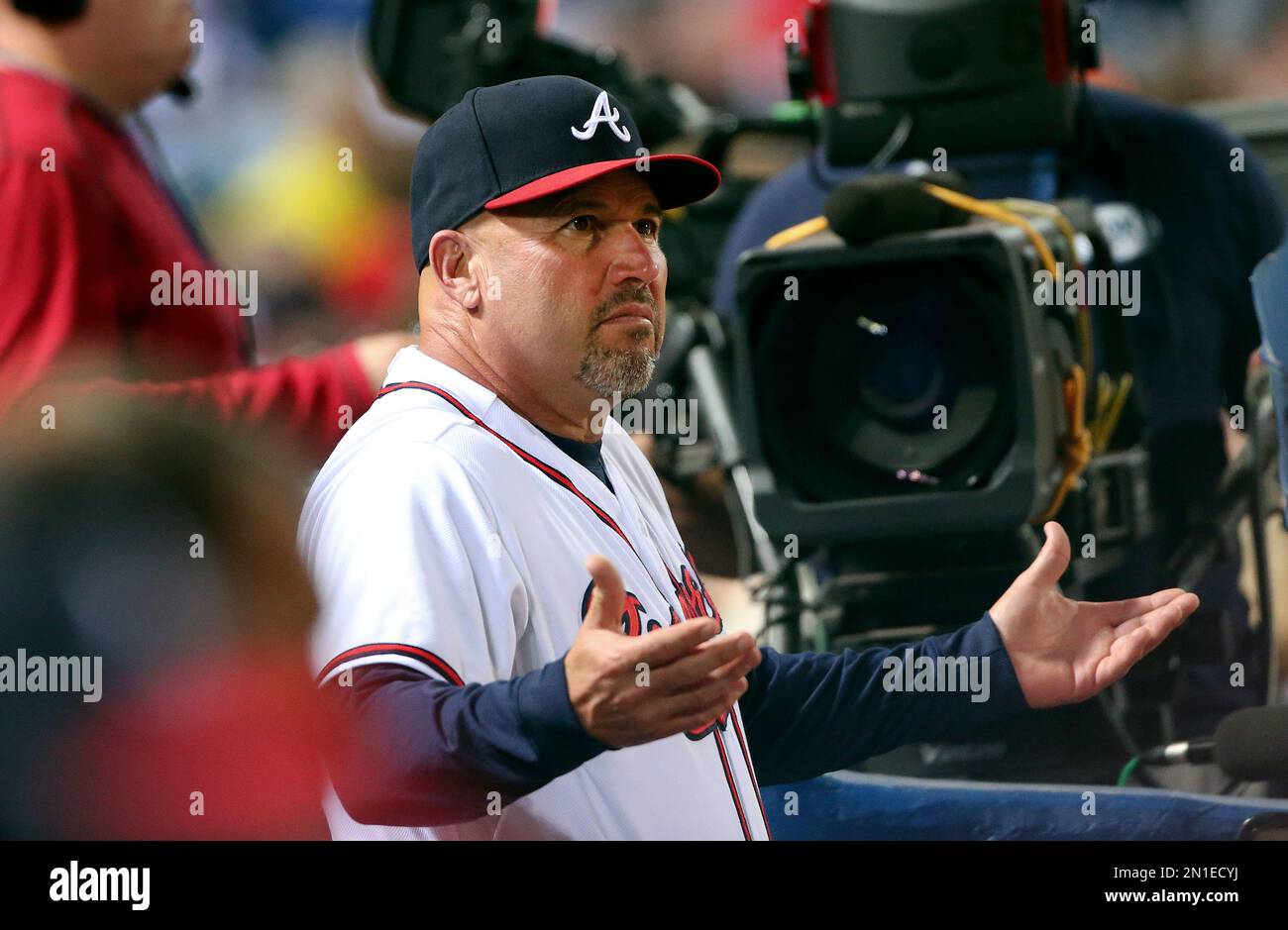Atlanta Braves manager Fredi Gonzalez (33) argues from the dugout ...