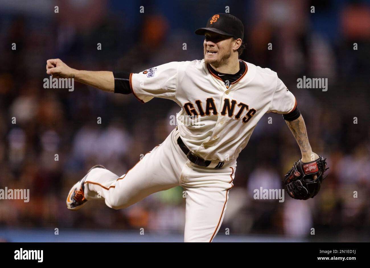 San Francisco Giants pitcher Jake Peavy watches a delivery to the ...
