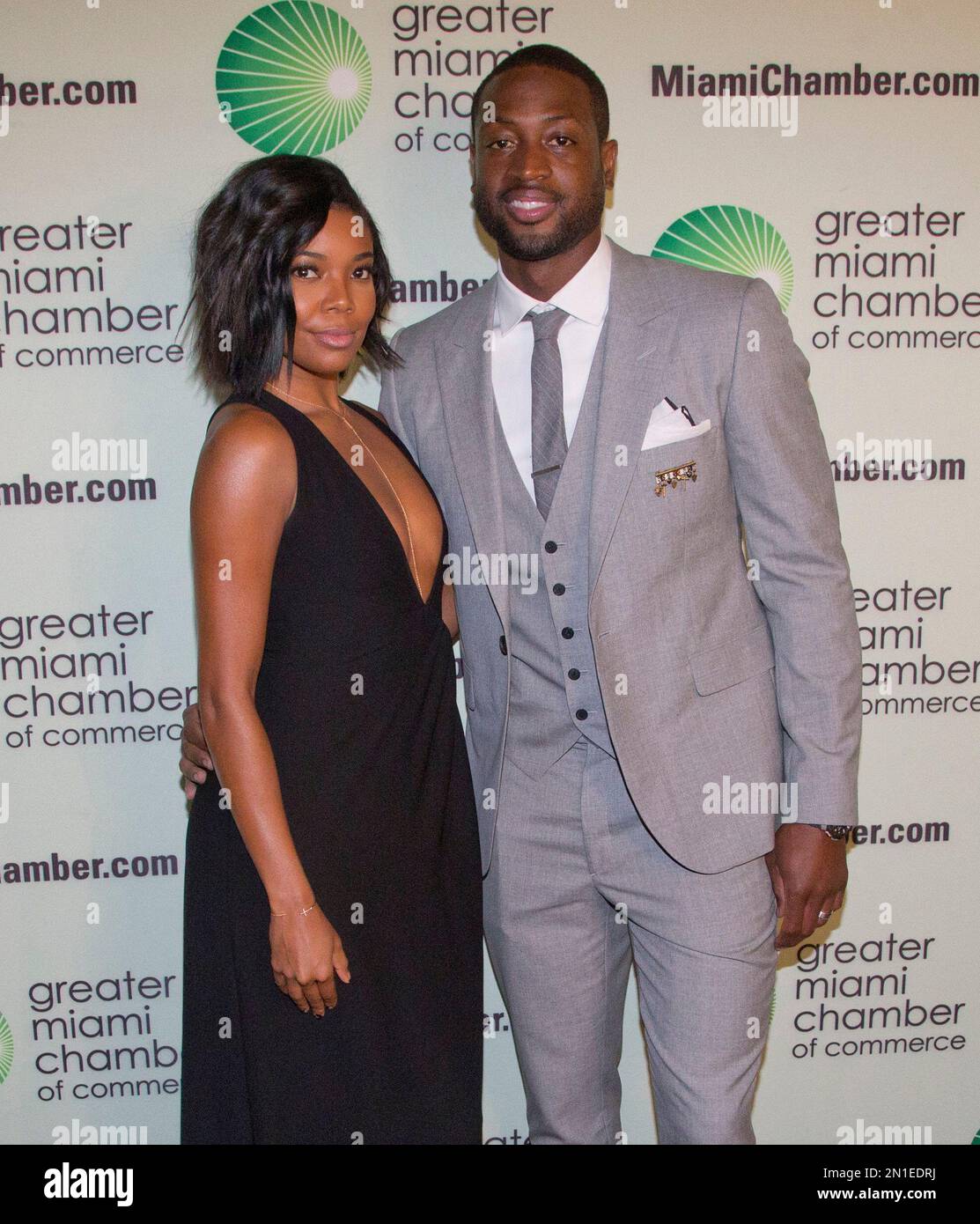 Miami Heat's Dwyane Wade, right, and his wife, Gabrielle Union, pose ...
