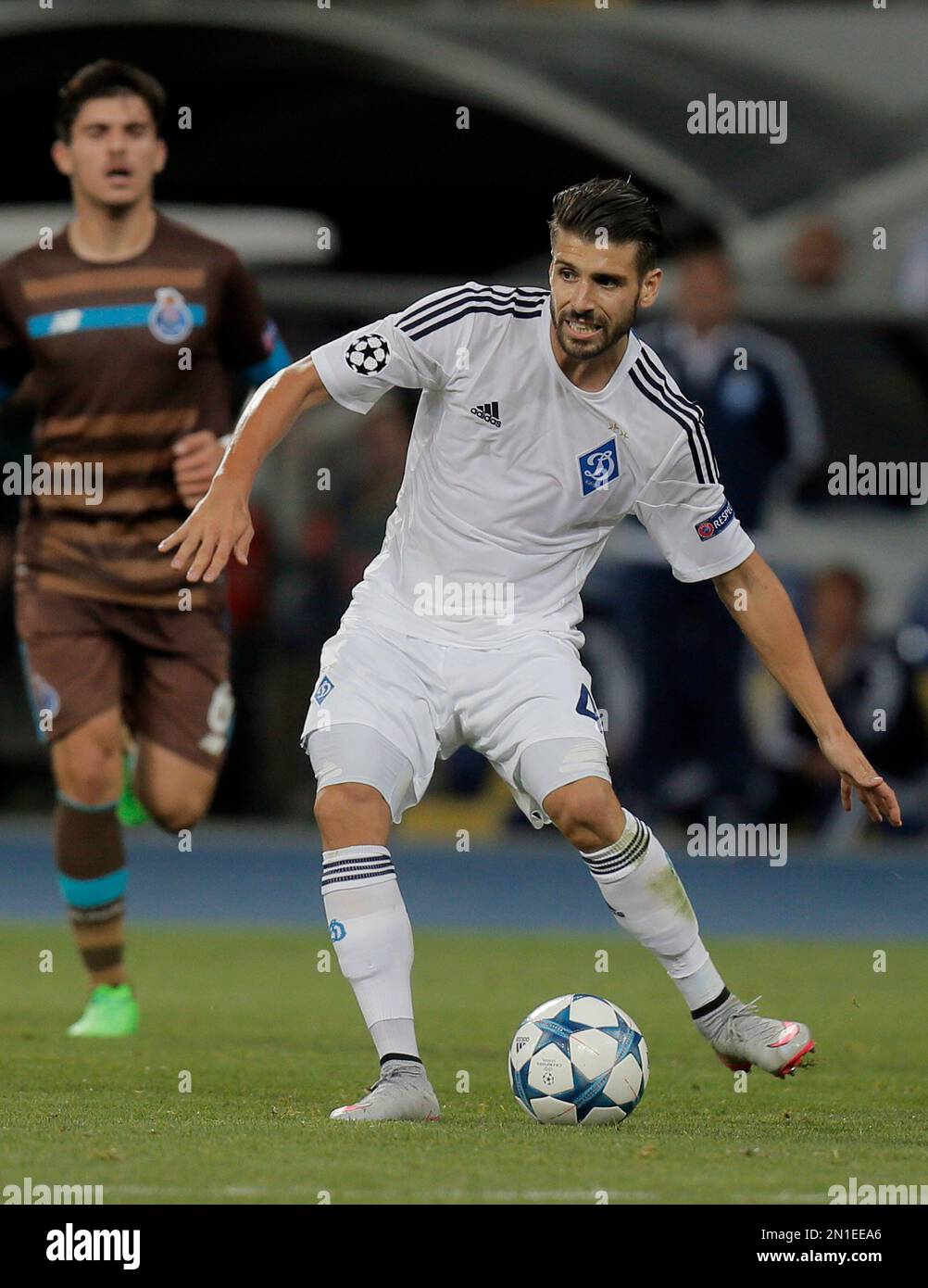 Miguel Veloso, foreground, of Dynamo Kiev controls the ball past Ruben ...