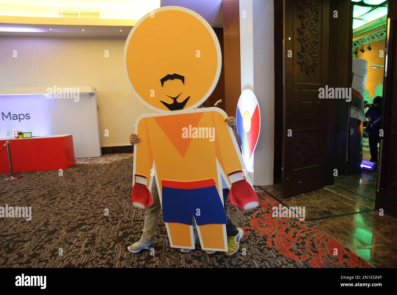 Men carry a "Pegman" version of Filipino boxing icon Manny Pacquiao ...