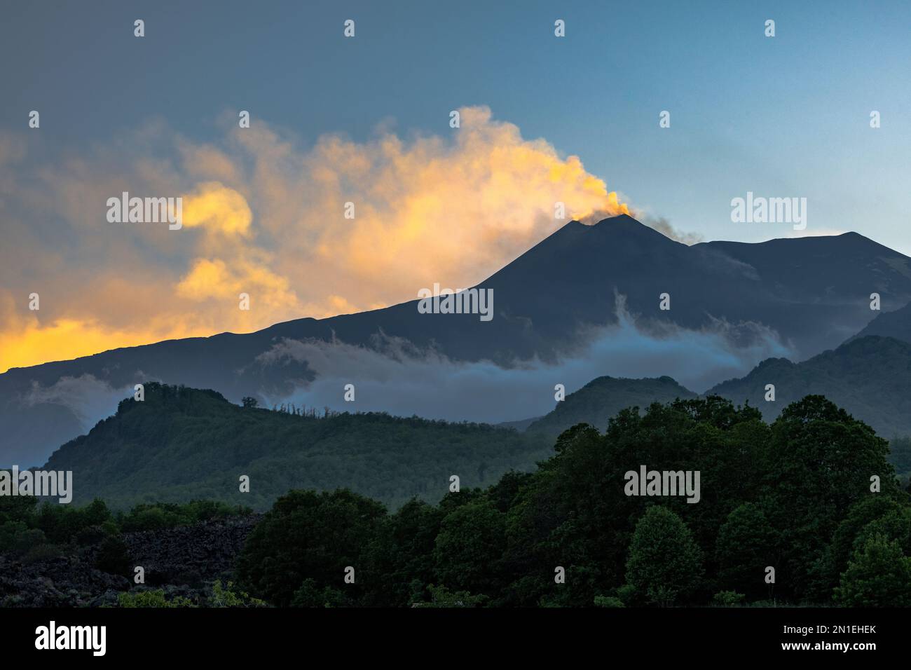 The smoking south-east crater of Mount Etna, Sicily, Europe's highest ...
