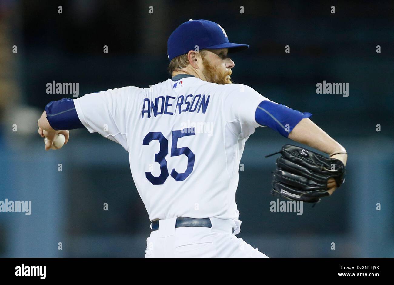 Los Angeles Dodgers starting pitcher Brett Anderson delivers against ...
