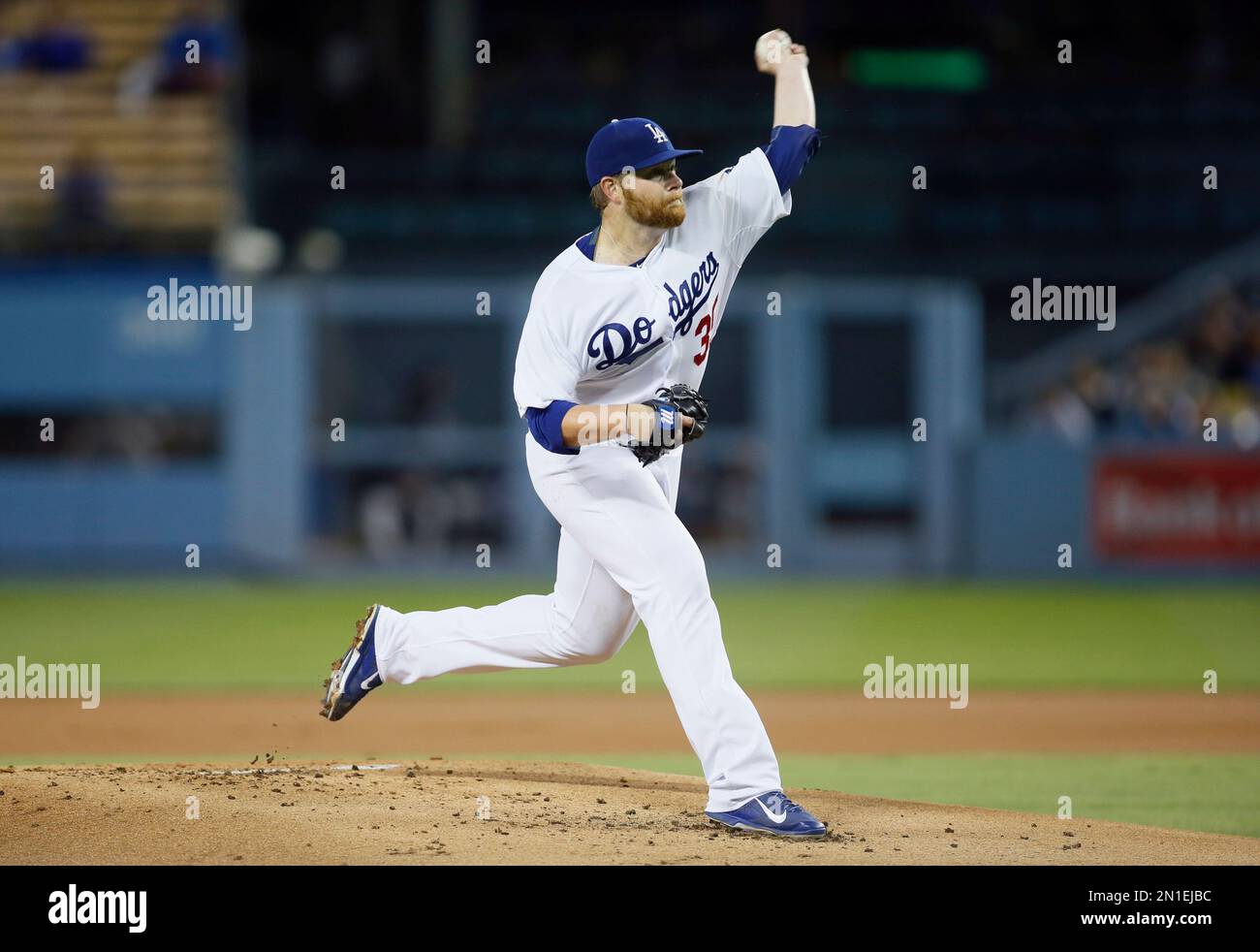 Los Angeles Dodgers starting pitcher Brett Anderson delivers against ...
