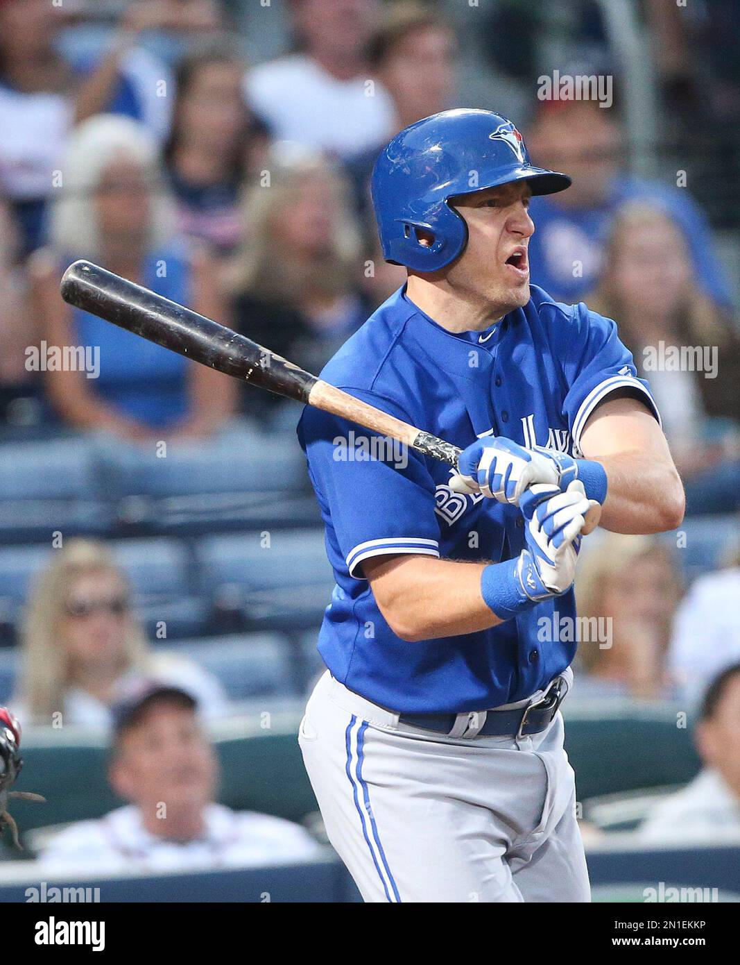 Toronto Blue Jays' Cliff Pennington (9) drives in a run with a base hit ...