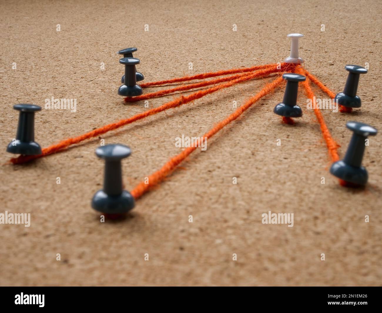 Pins connected with a rope. Leadership and delegation concept Stock ...