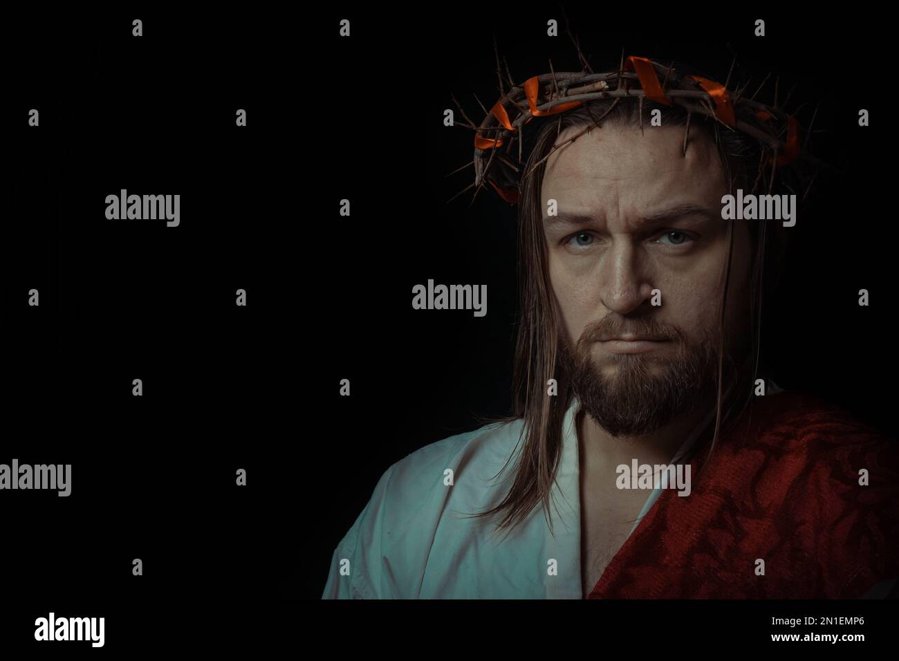 Jesus Christ wearing a crown of thorns and white chiton toga mantle ...