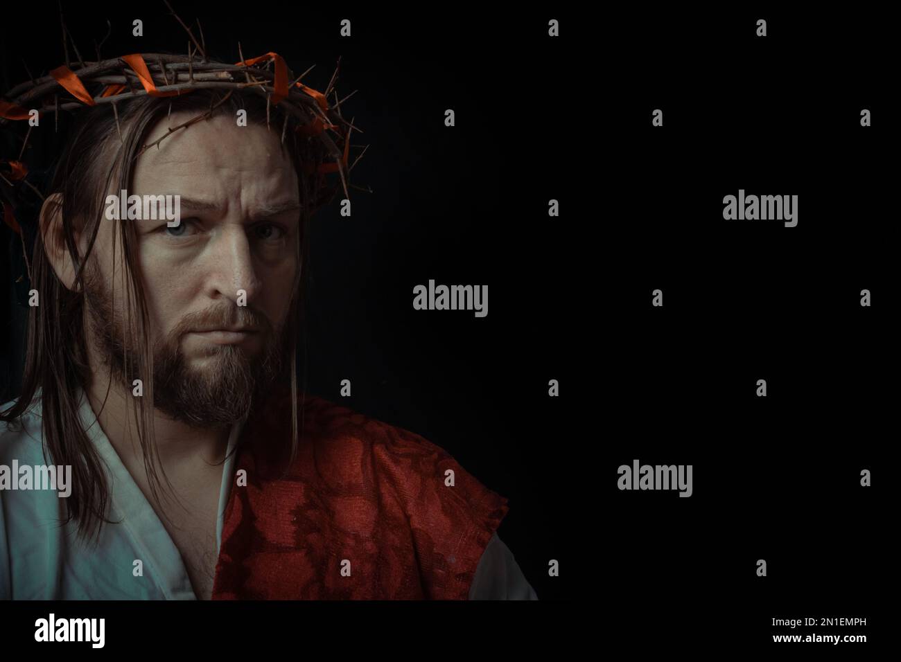 Jesus Christ wearing a crown of thorns and white chiton toga mantle ...