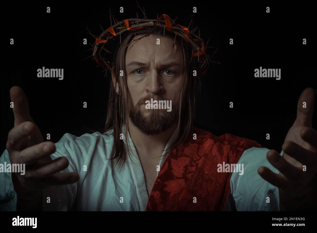 Jesus Christ wearing a crown of thorns and white chiton toga mantle ...