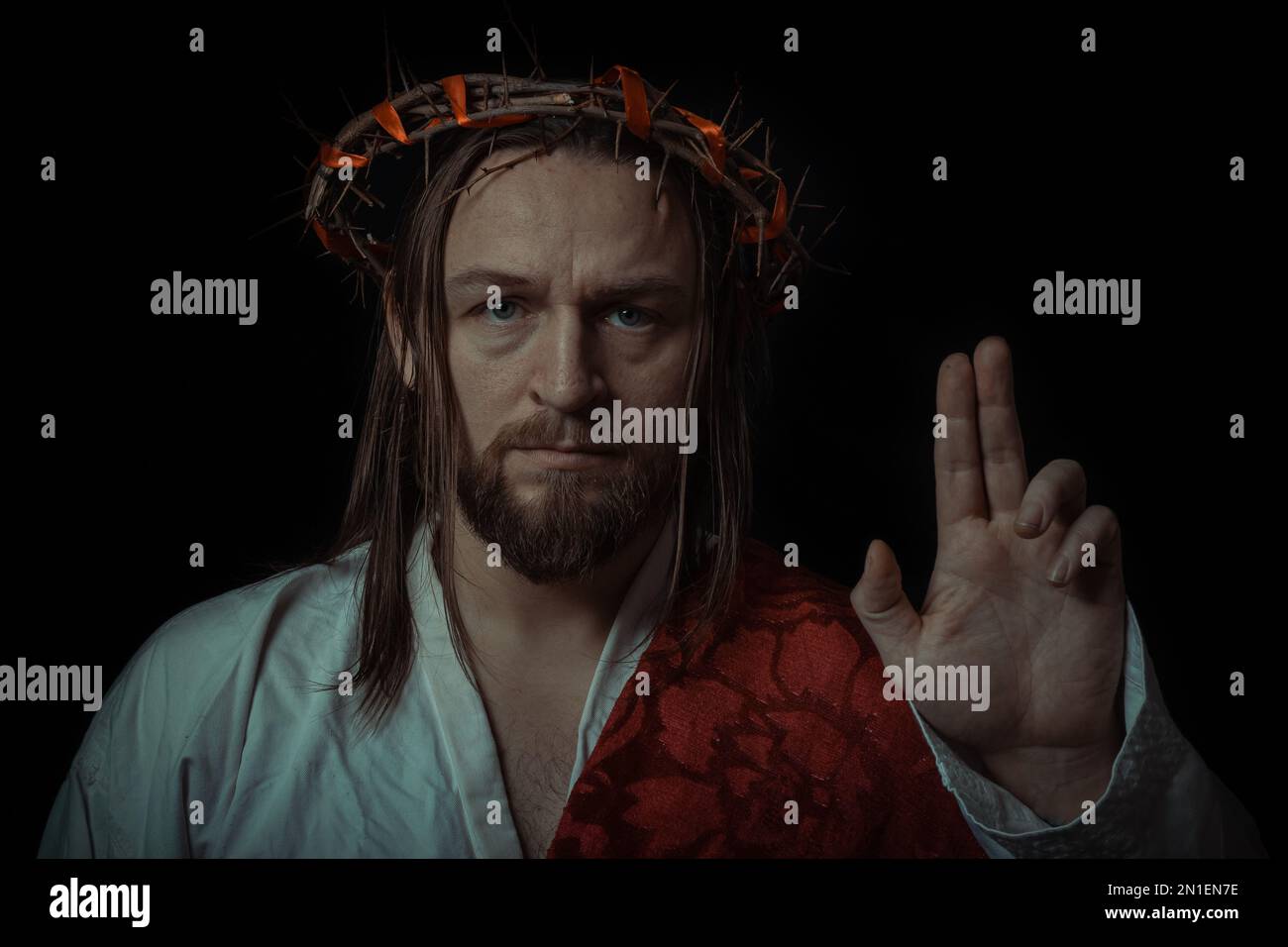 Jesus Christ wearing a crown of thorns and white chiton toga mantle ...