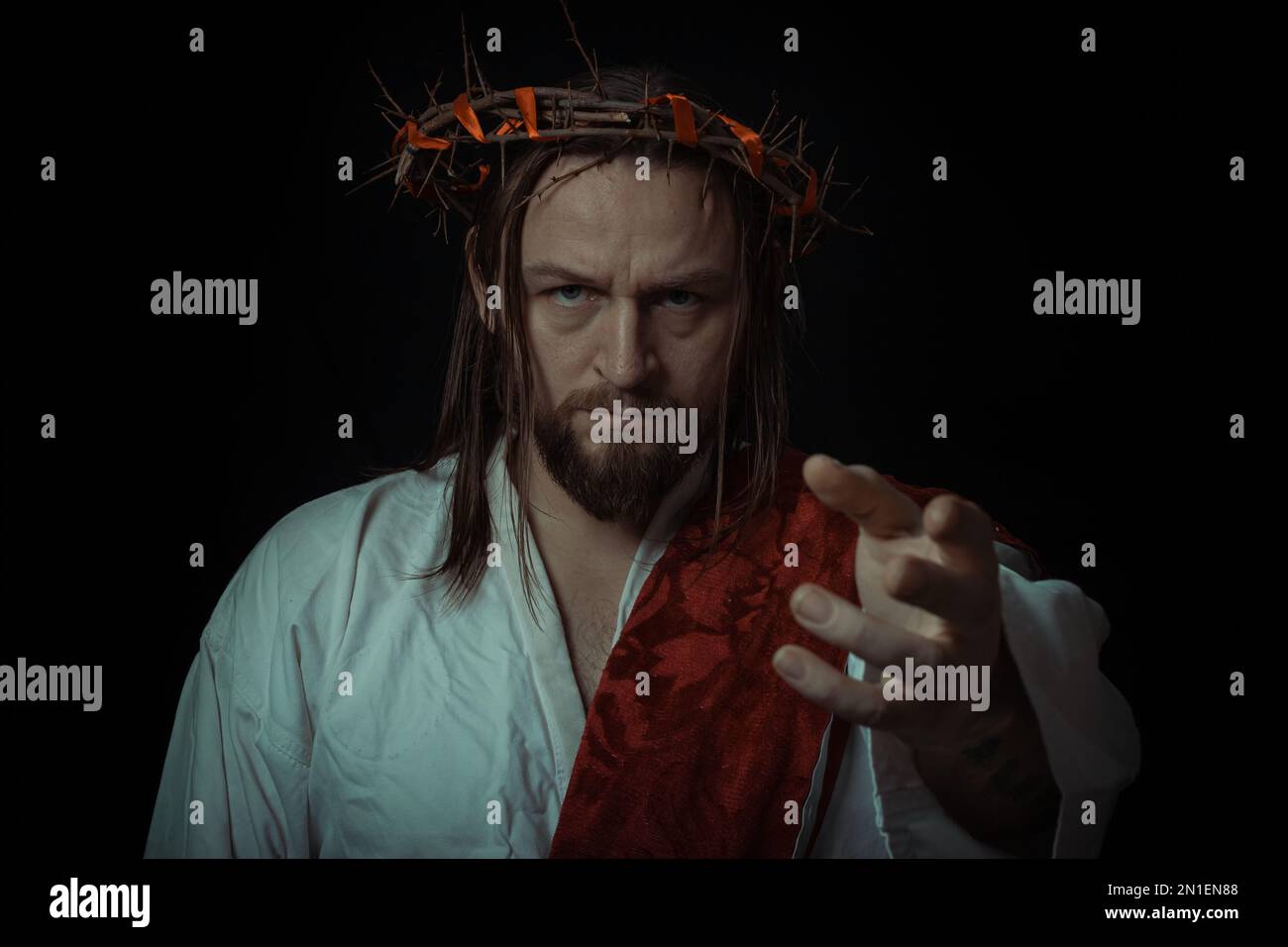 Jesus Christ wearing a crown of thorns and white chiton toga mantle ...