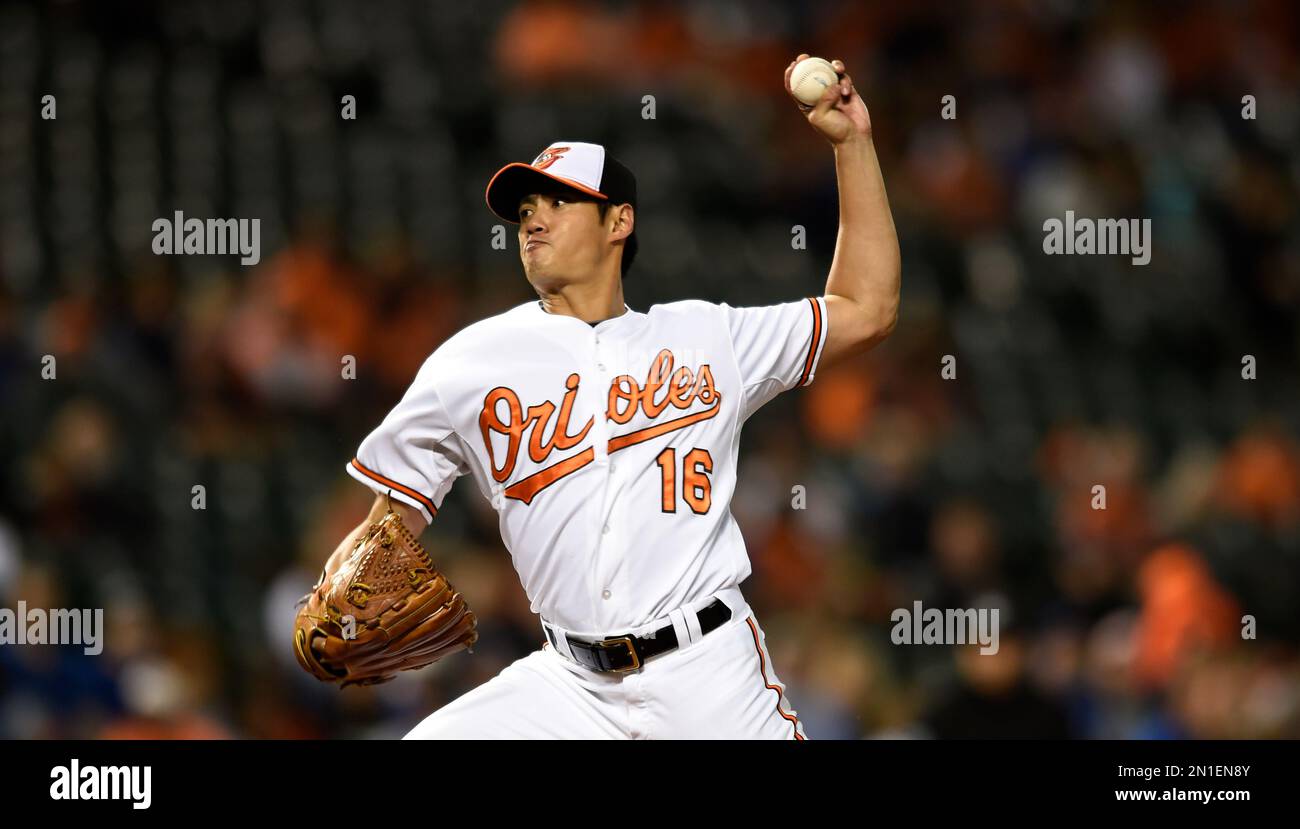 Baltimore Orioles starting pitcher Wei-Yin Chen delivers against the ...